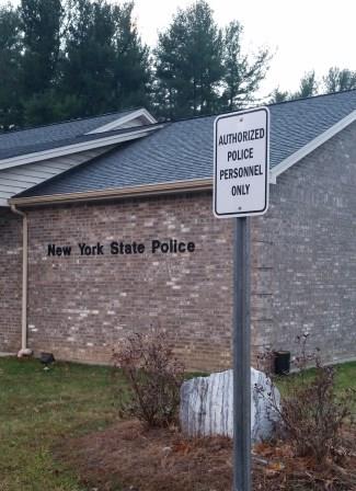 Authorized Police Personnel Only In Front of Police Building – DNA Signs